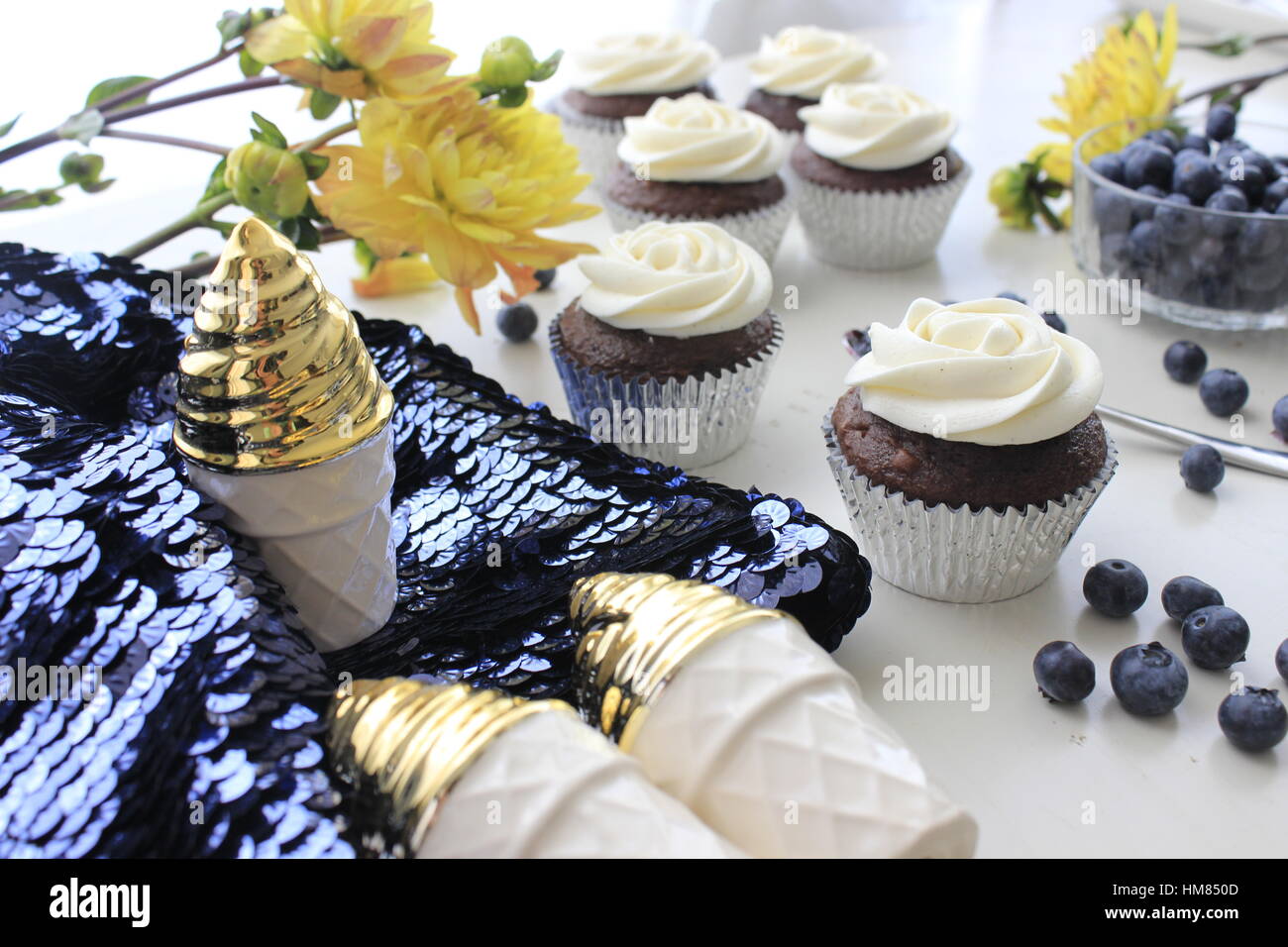 Yellow and blue cupcake hi-res stock photography and images - Alamy