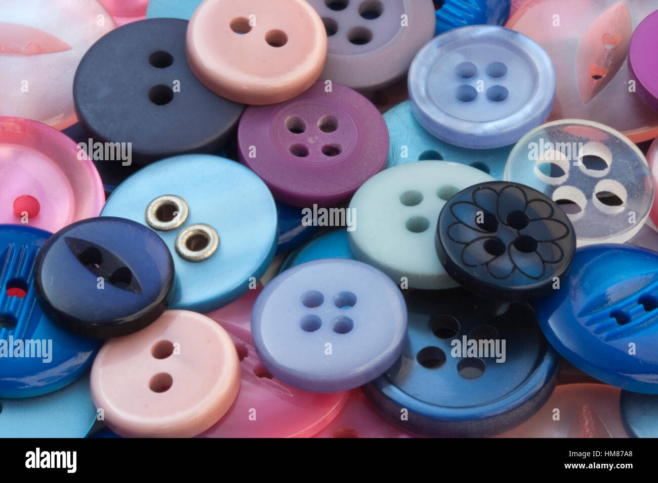 Pink and blue sewing buttons Stock Photo - Alamy