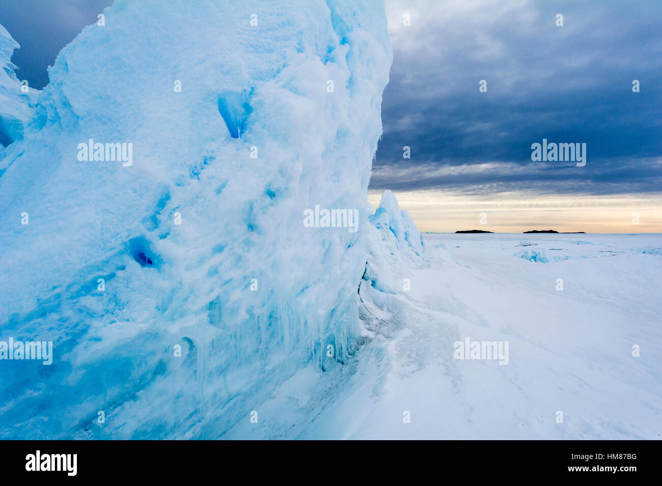 Fractured ice blocks pushed skywards along pressure ridges in the sea ...