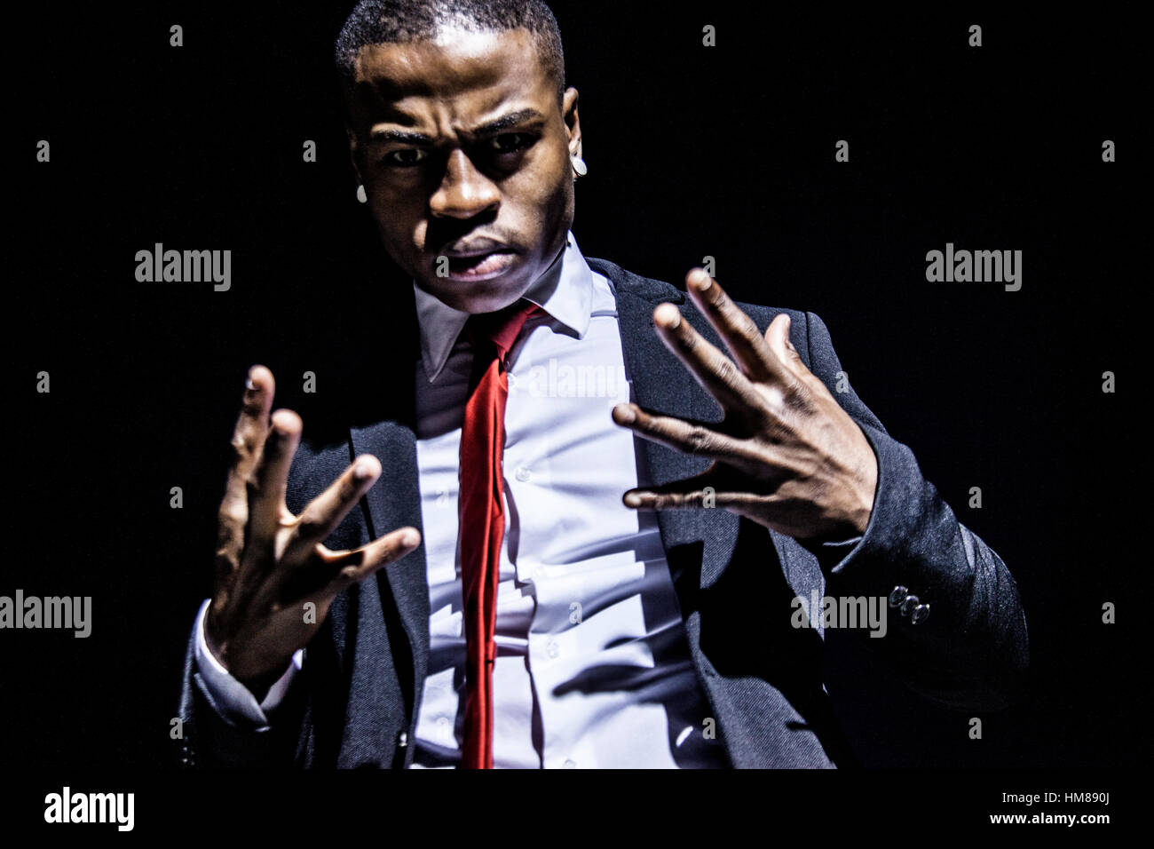 Serious young man suit hi-res stock photography and images - Alamy