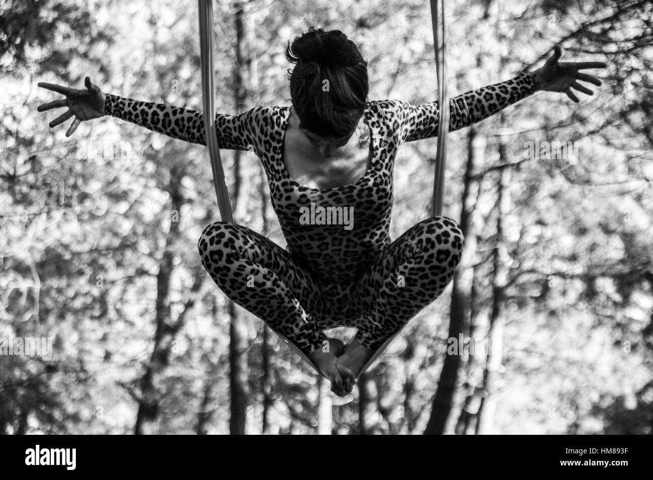 Woman in Anti-Gravity Yoga Position Outdoor Stock Photo - Alamy