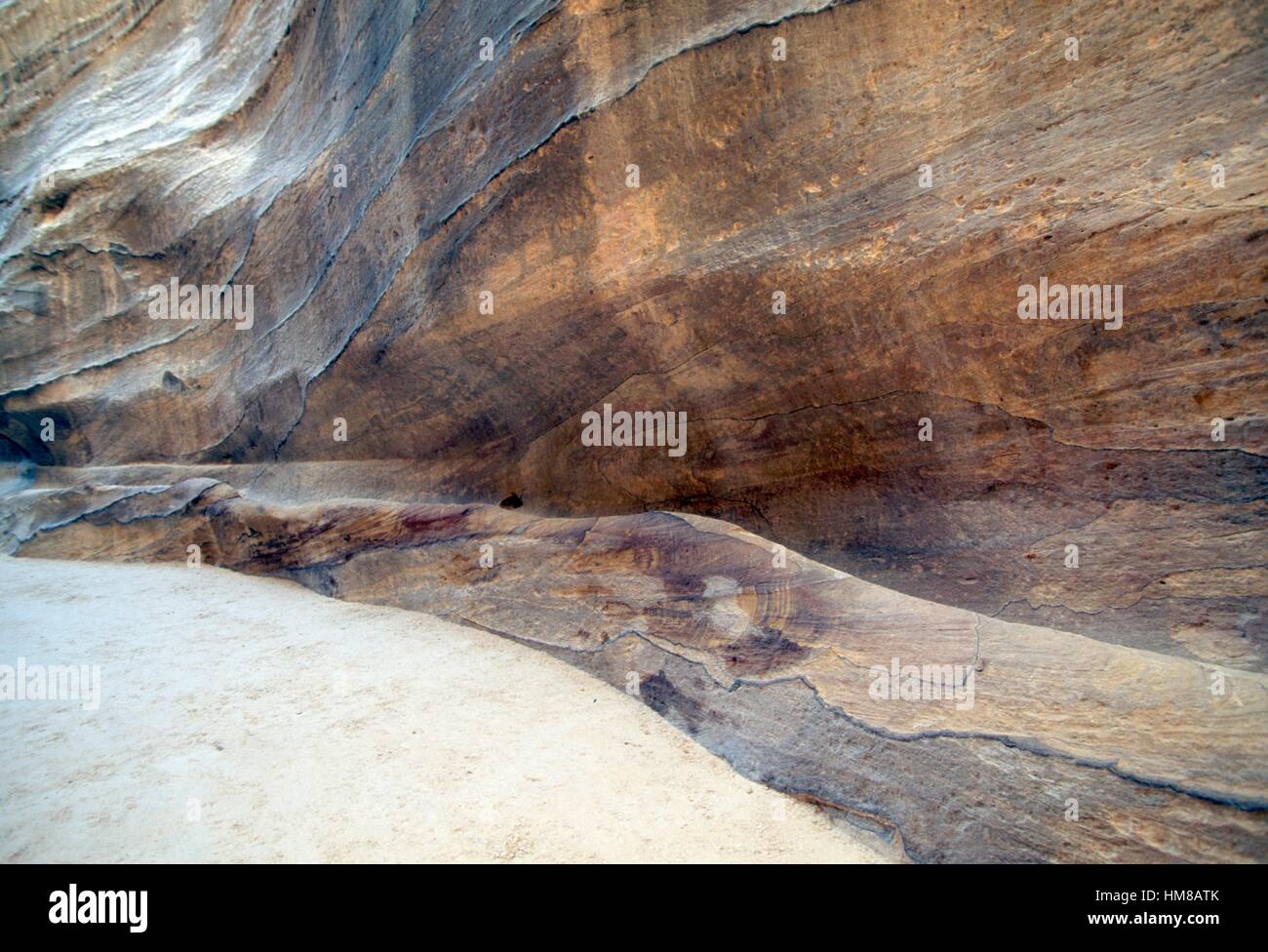 Rock wall of the Siq canyon smoothed by water erosion, Petra, Jordan ...