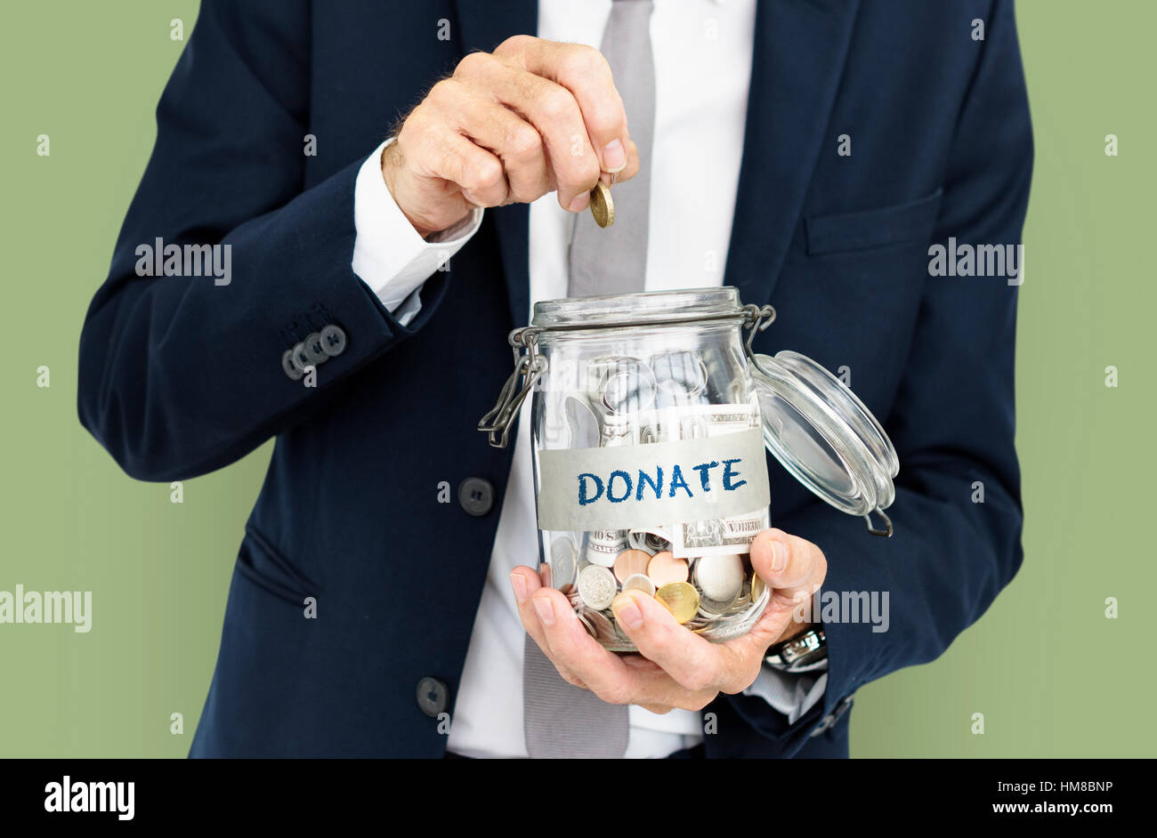 Businessman GIving Money Donation Charity Concept Stock Photo - Alamy