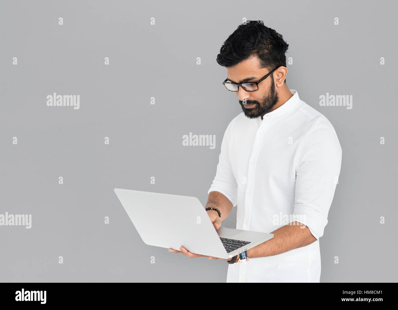 Indian Man With Laptop Concept Stock Photo - Alamy