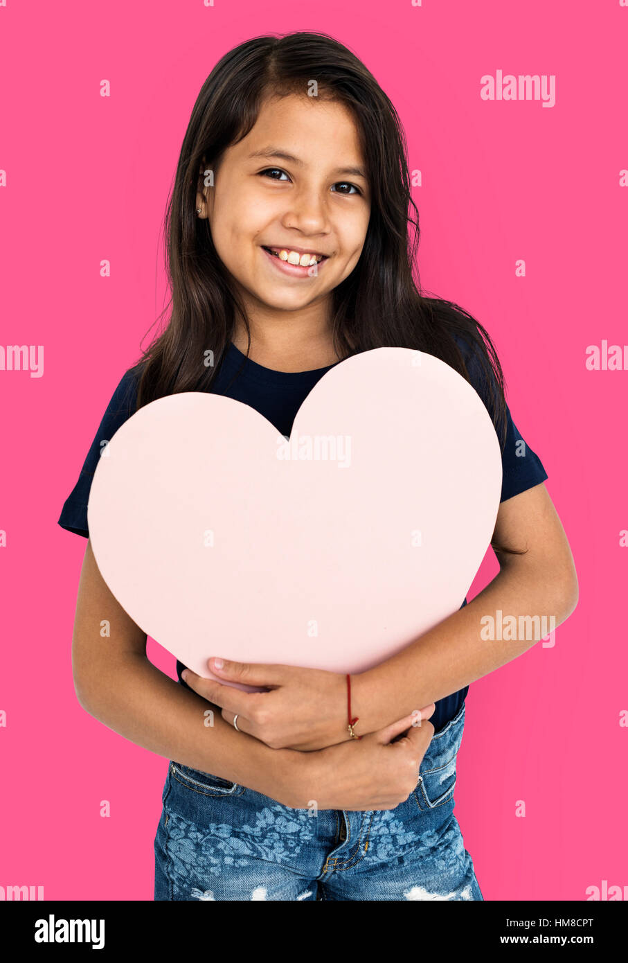 Little Girl Carrying Heart Concept Stock Photo - Alamy