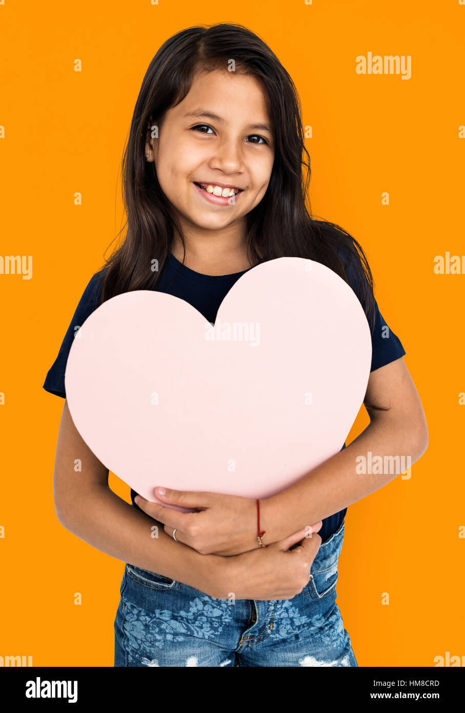 Little Girl Carrying Heart Concept Stock Photo - Alamy