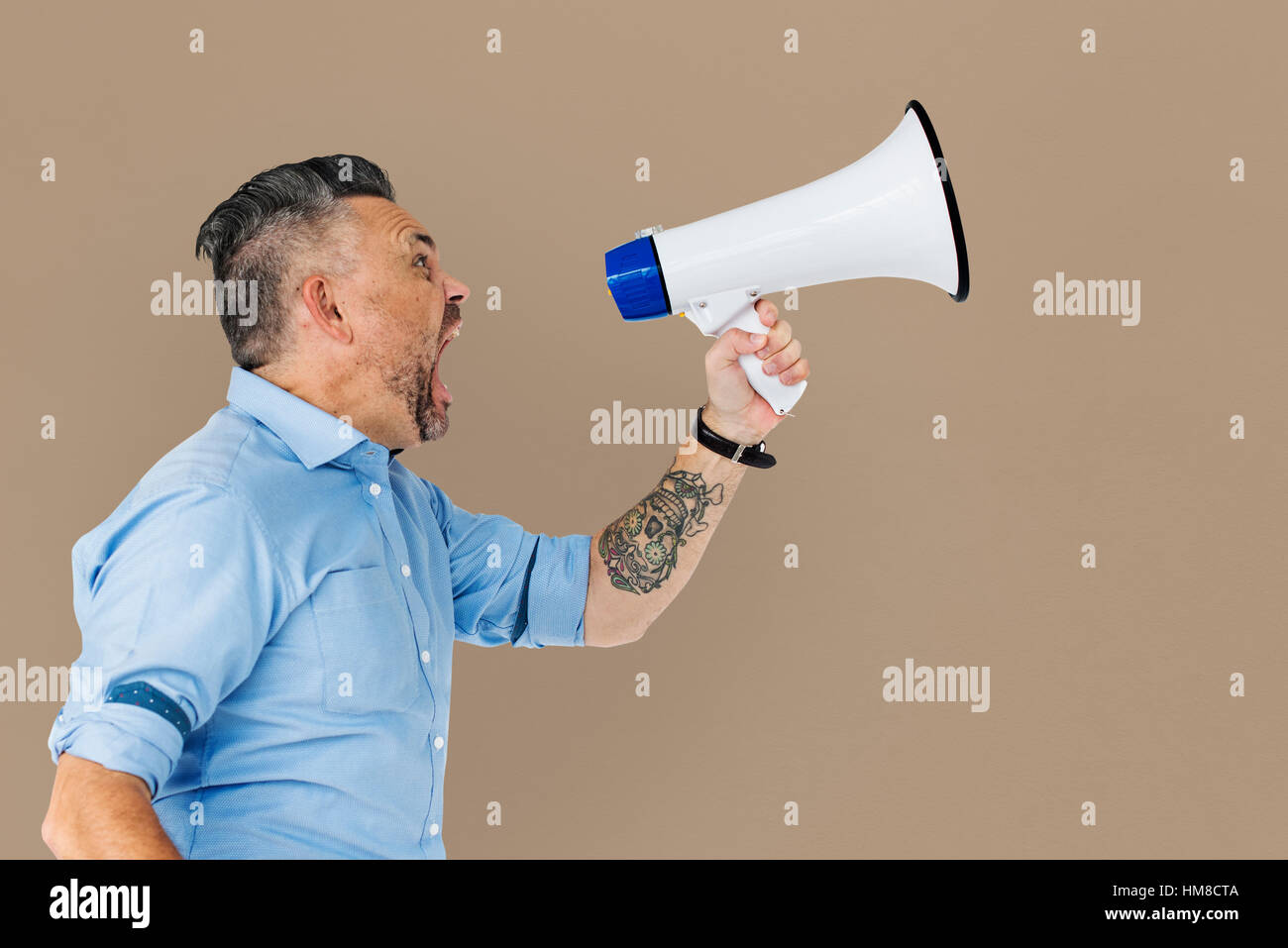 Man Holding Megaphone Studio Concept Stock Photo - Alamy