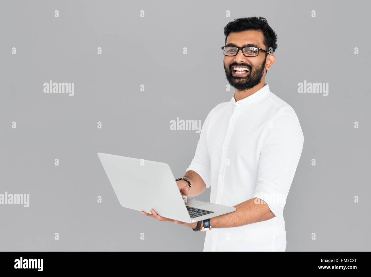 Cheerful Man Technology Gadget Concept Stock Photo - Alamy