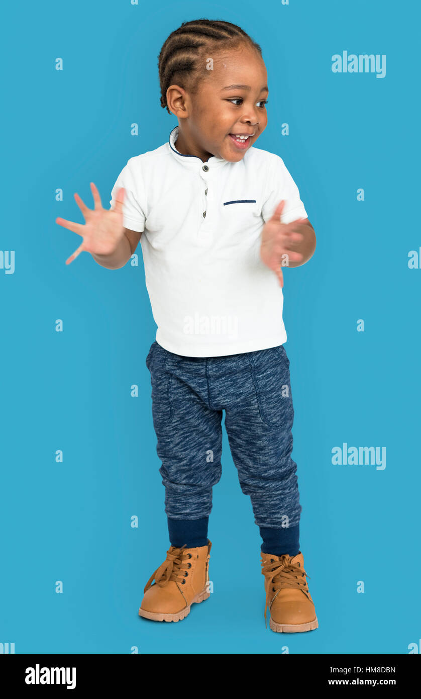 Kid Pose Standing Studio Concept Stock Photo - Alamy