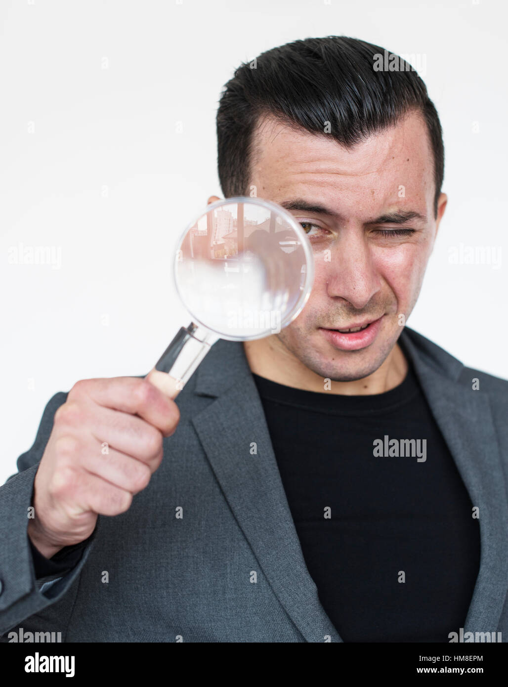 Caucasian Business Man Magnifying Glass Concept Stock Photo - Alamy
