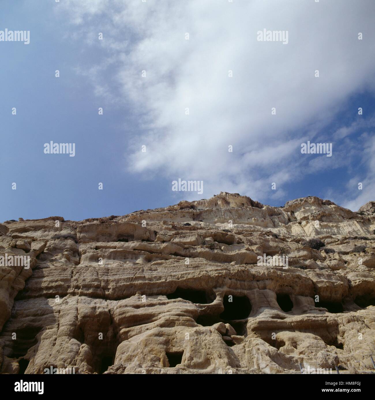 Caves in the cliffs at Matala, Crete, Greece Stock Photo - Alamy