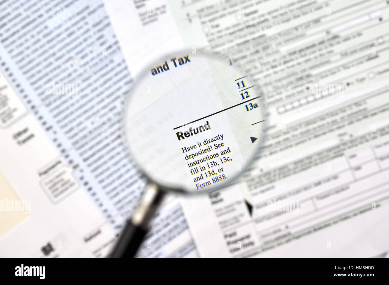 'Refund' under magnifying glass on 1040 U.S individual income tax ...