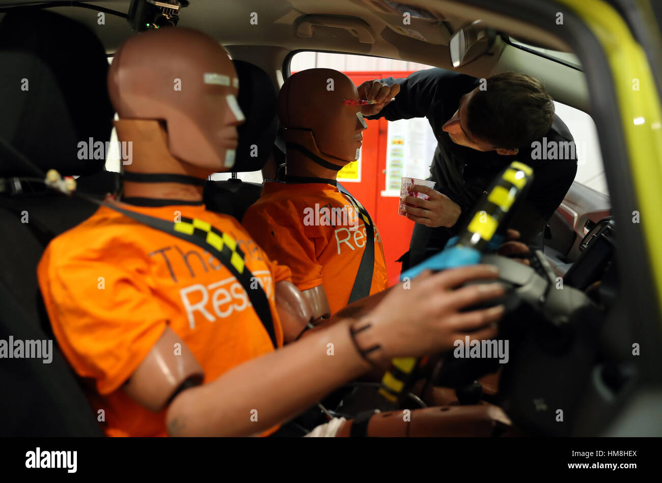 EMBARGOED TO 0001 THURSDAY FEBRUARY 2 Technicians paint parts of crash ...