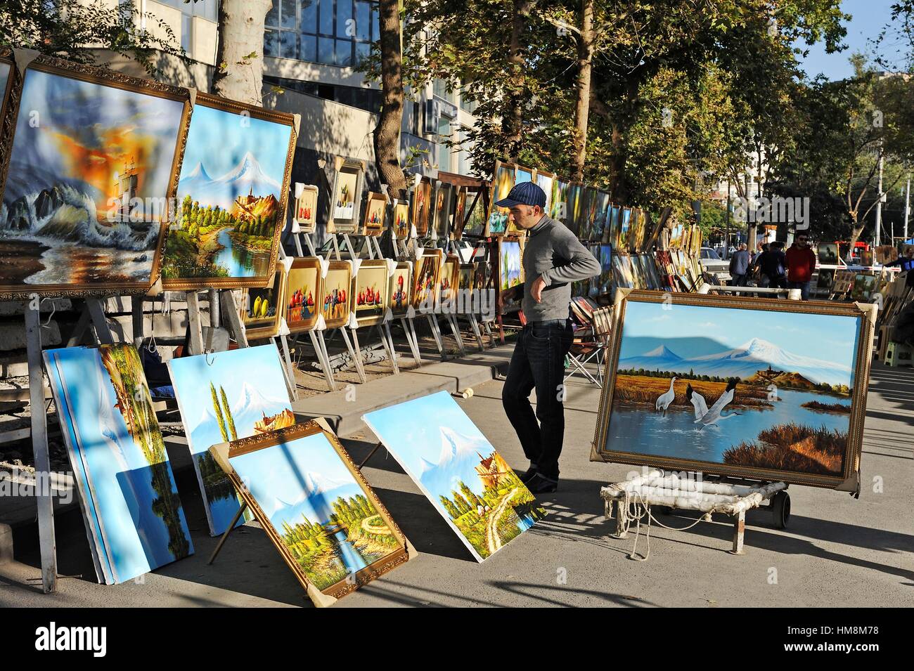 paintings at Yerevan Vernissage, a large open-air market situated Stock ...
