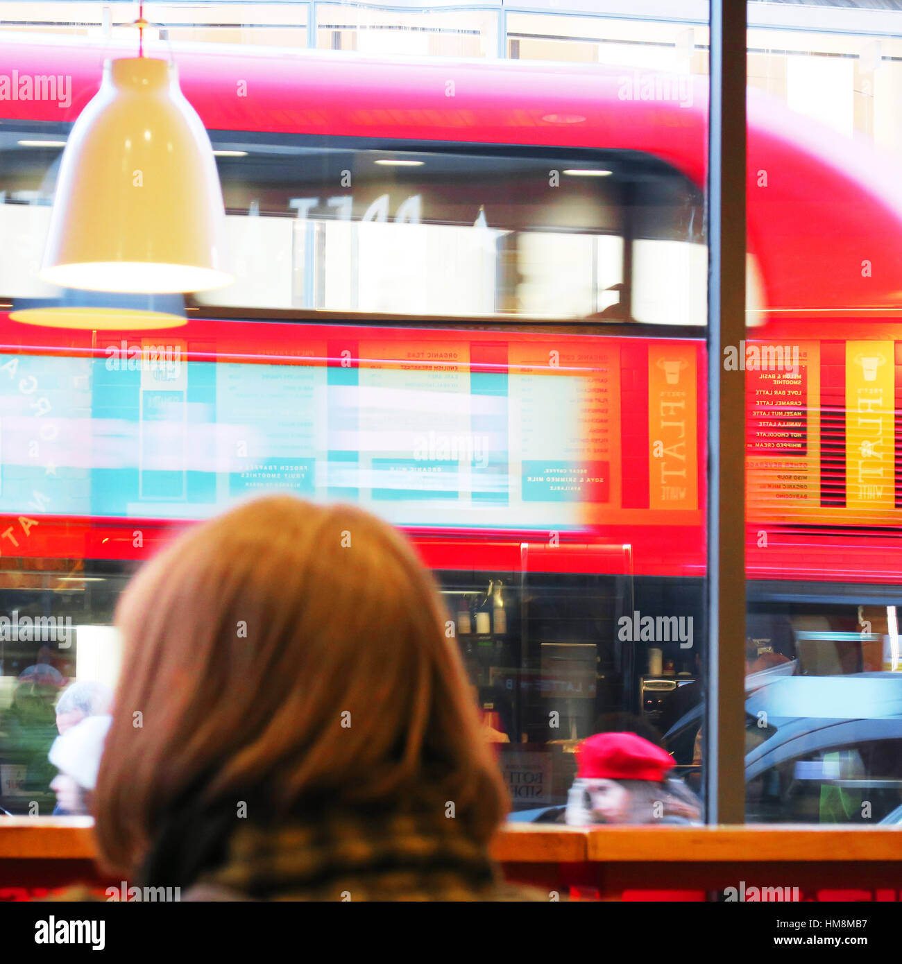 visitor in London coffee-shop and red bus England Stock Photo - Alamy