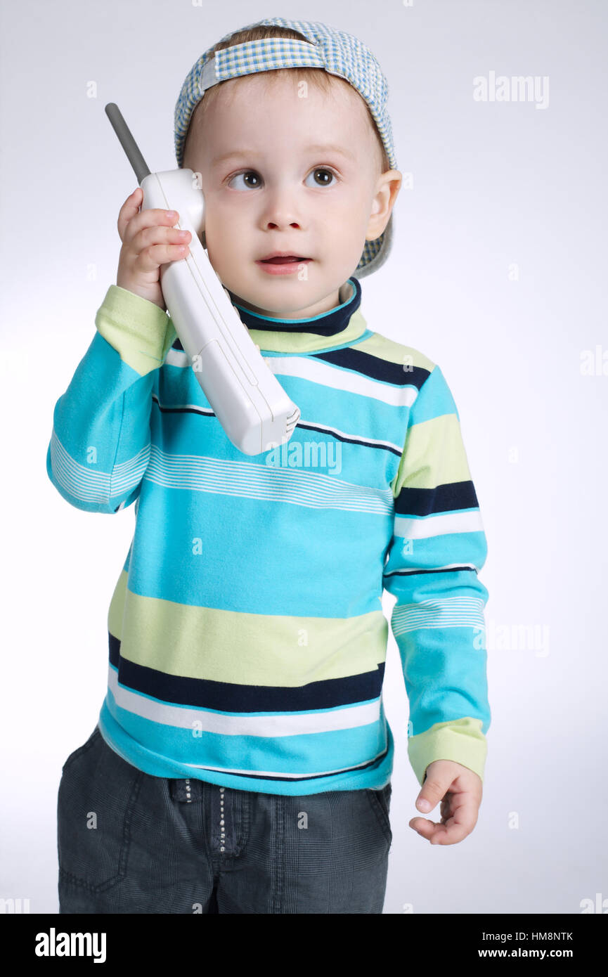 little boy talking on the phone Stock Photo - Alamy