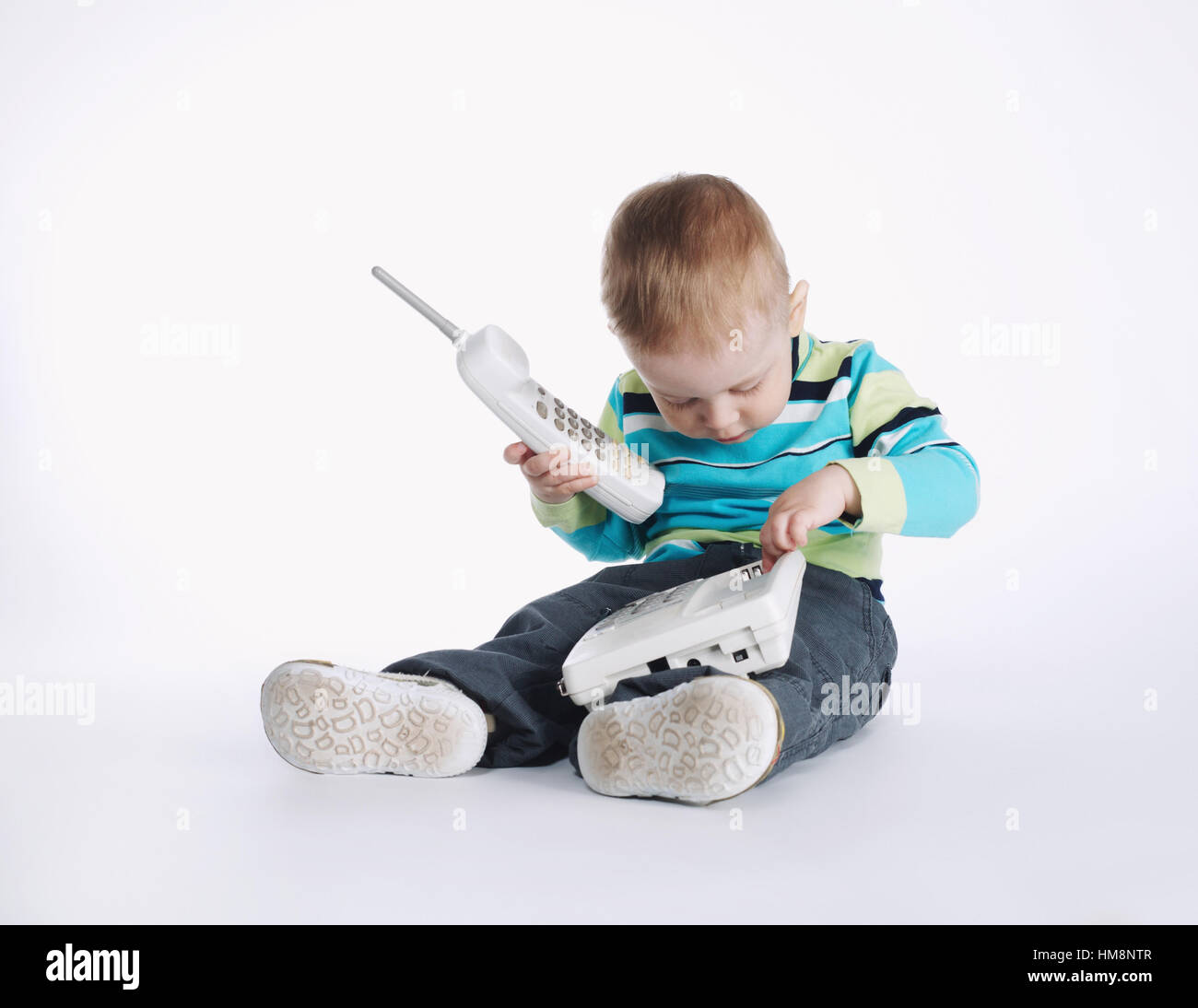 little boy talking on the phone Stock Photo - Alamy