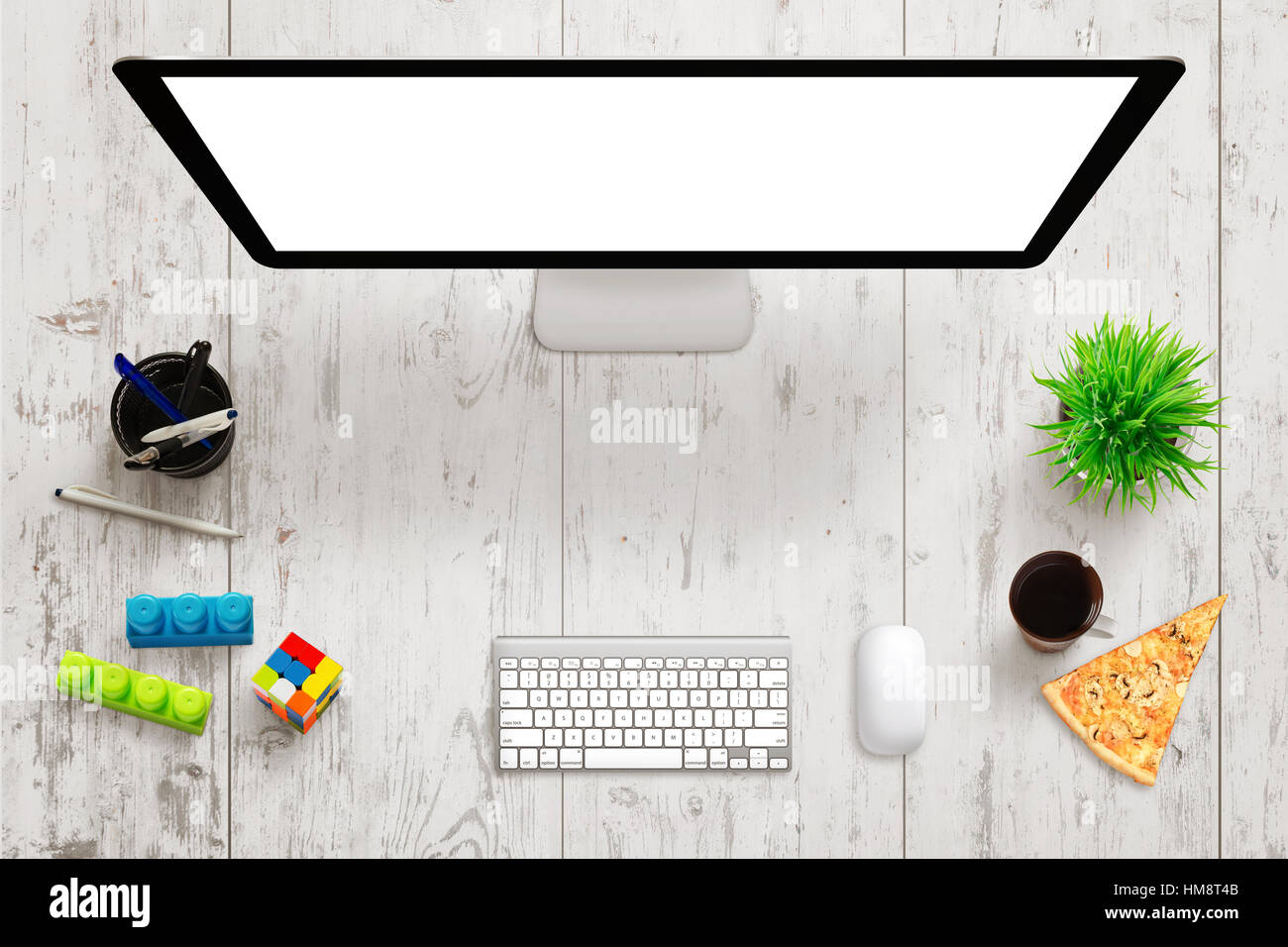 Top view of white wooden table office desk. Computer display with ...