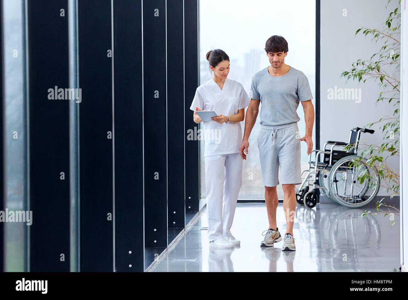 Physical therapist with computer hi-res stock photography and images ...