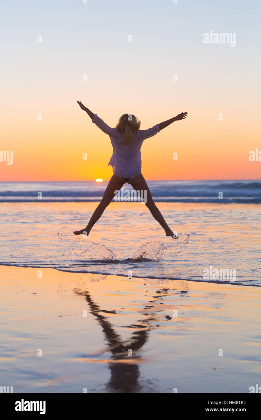 Woman vitality jumping hi-res stock photography and images - Alamy
