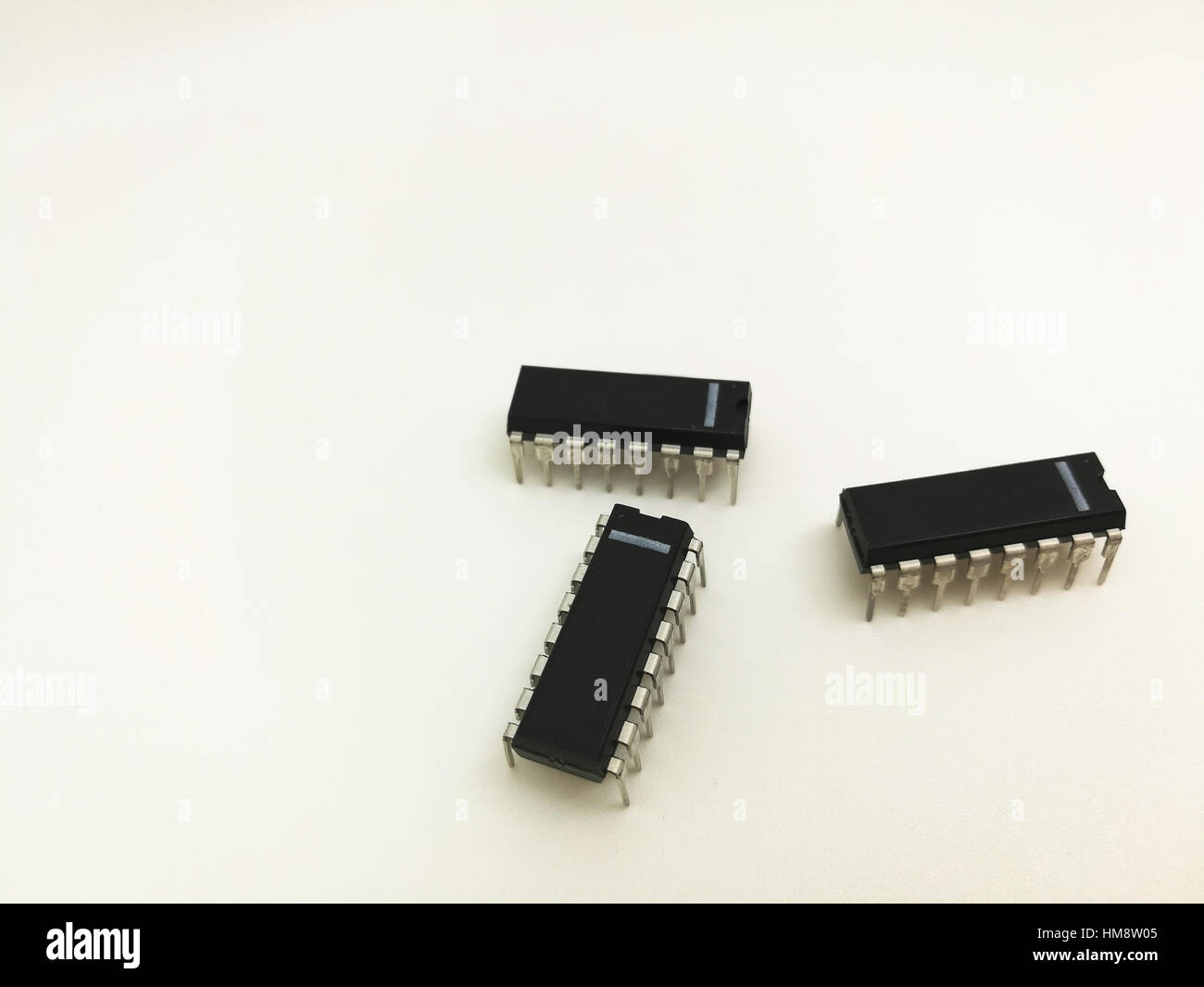 Integrated circuits on a white background Stock Photo - Alamy