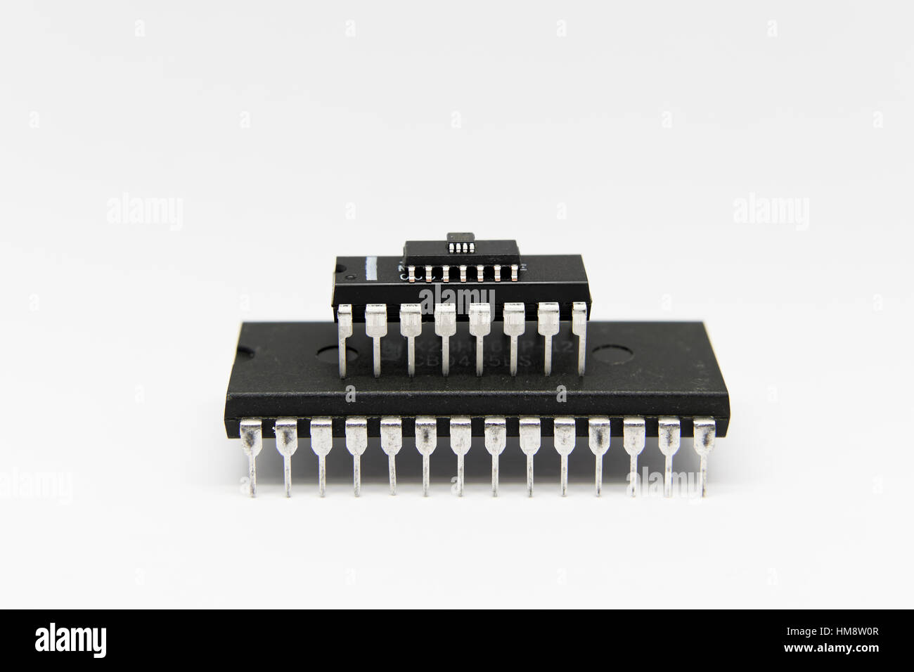 Different size and type integrated circuits stacked on a pile Stock ...