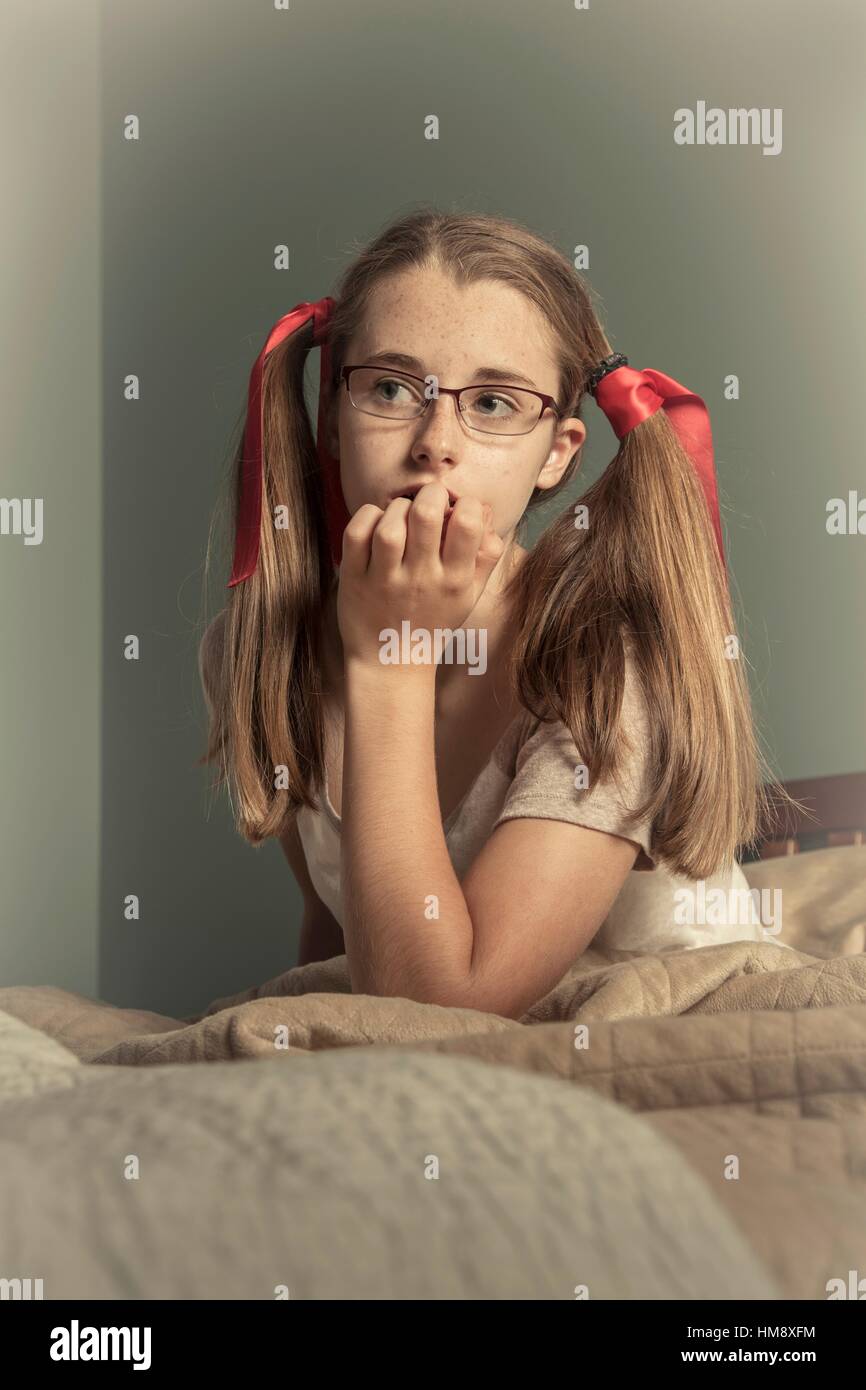 Red ribbons in hair hi-res stock photography and images - Alamy