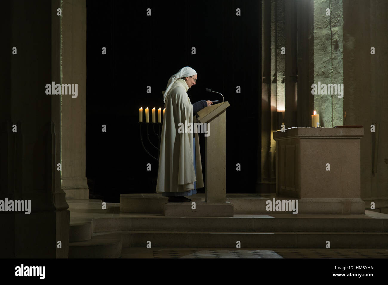 Nun inside the Church of Saint Gervais in Paris in winter Stock Photo ...
