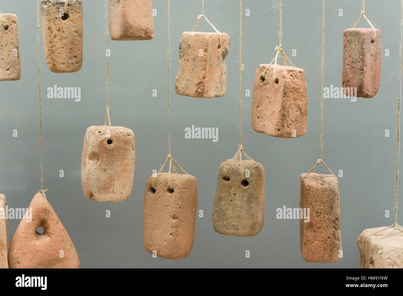 Loom weights hi-res stock photography and images - Alamy