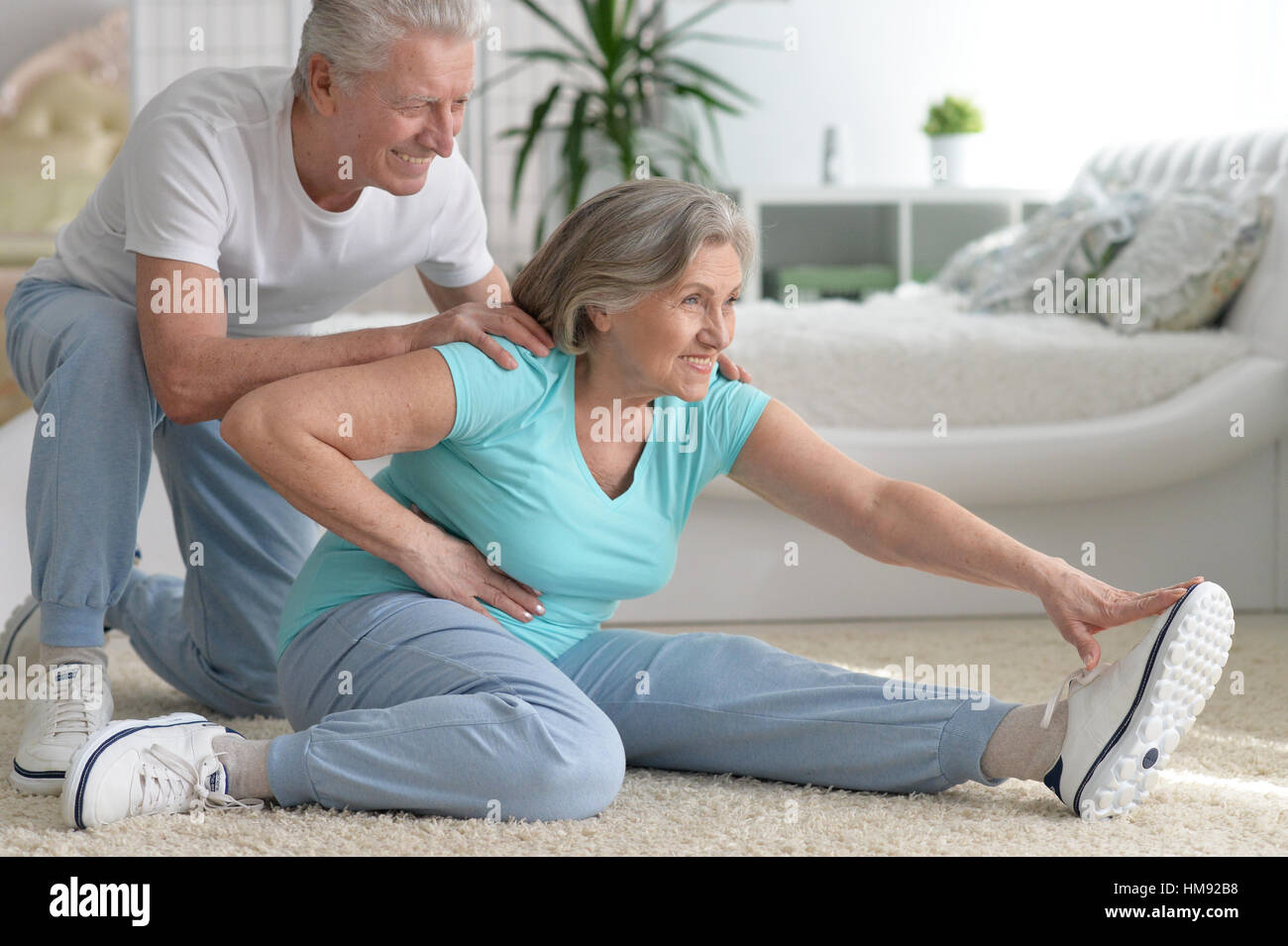 mature couple making exercises Stock Photo - Alamy