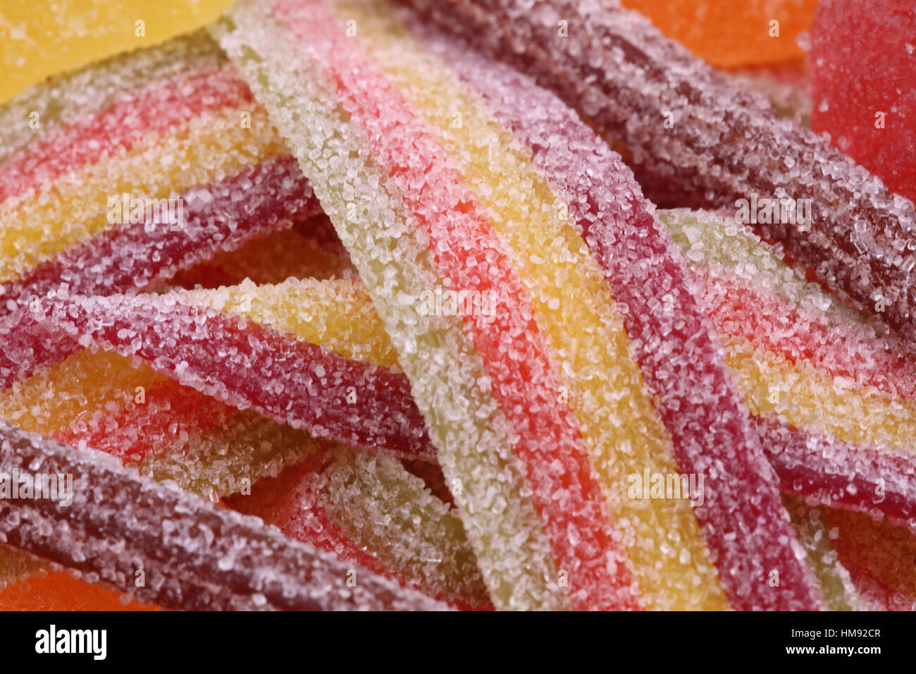 set sugary gummy candy and colored Stock Photo - Alamy