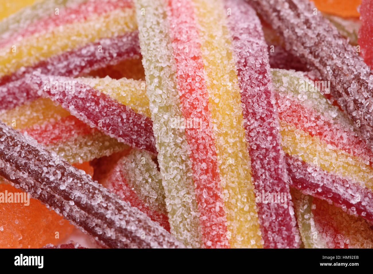 set sugary gummy candy and colored Stock Photo - Alamy