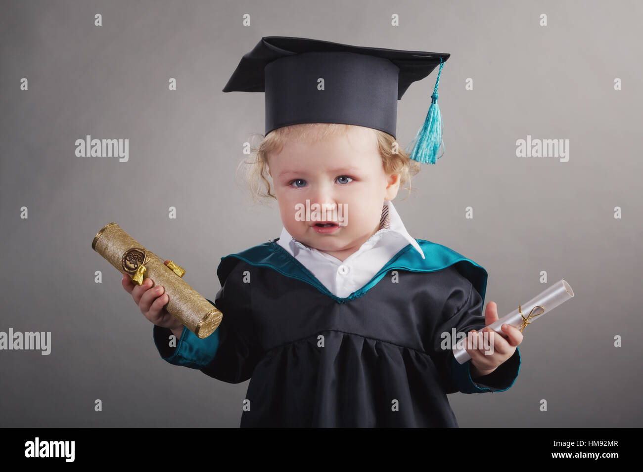 diploma graduating little student kid Stock Photo - Alamy