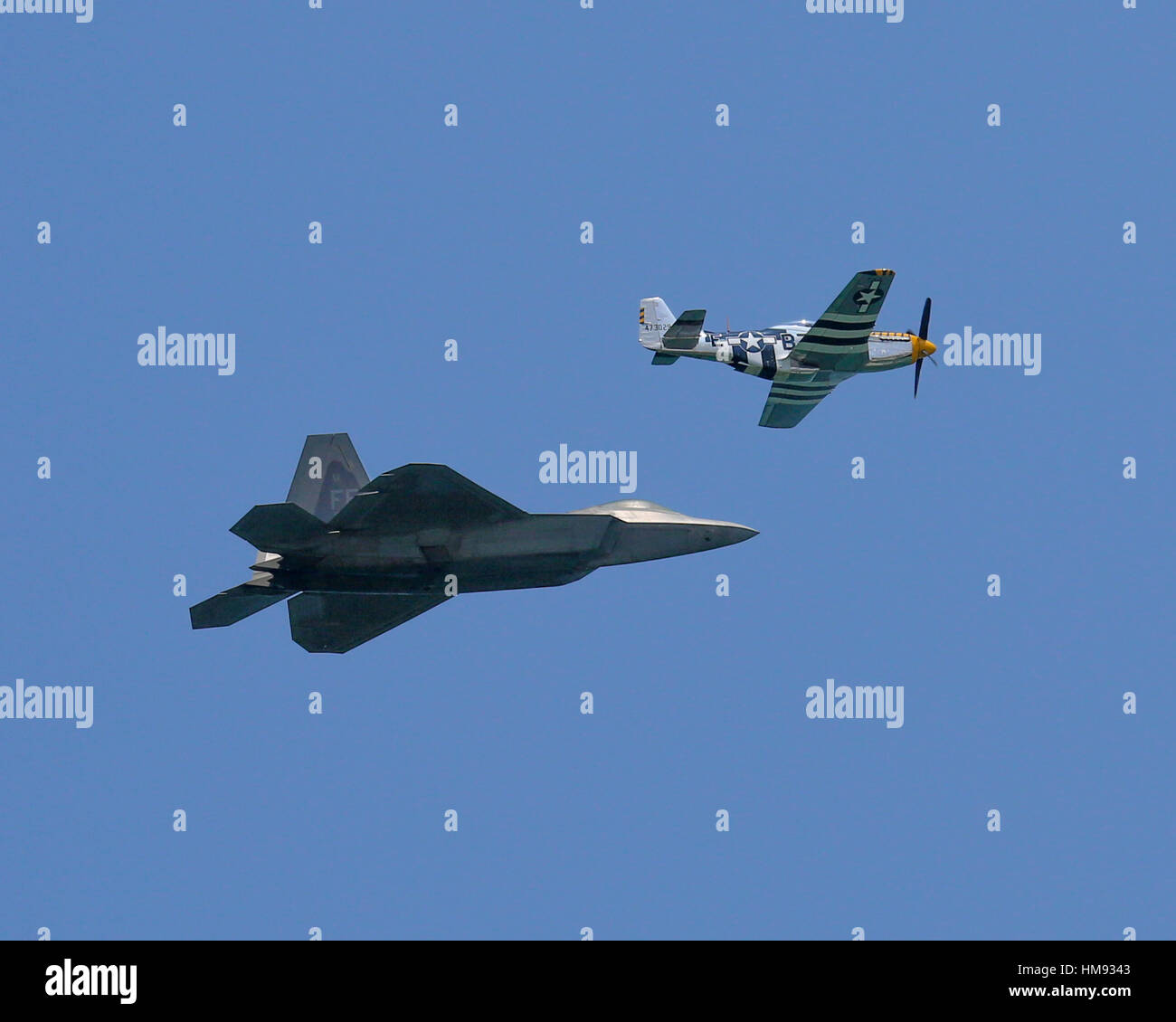 P-51 Mustang and F-22 Raptor in formation flight Stock Photo - Alamy