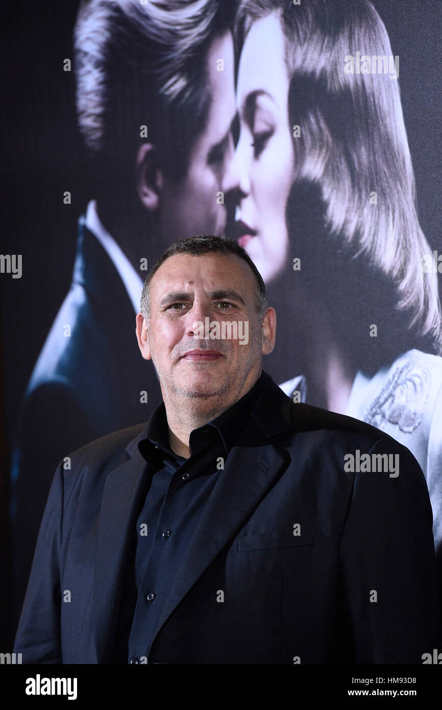 Graham King pose for photographers upon arrival at the premiere of the ...
