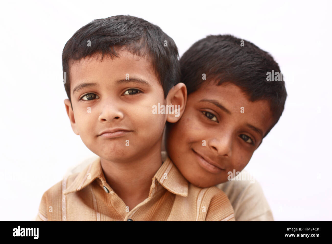 Elder brother holding younger Stock Photo - Alamy