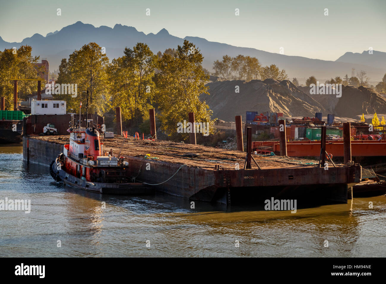 River barge and tug moored on the Fraser River, Vancouver, British ...