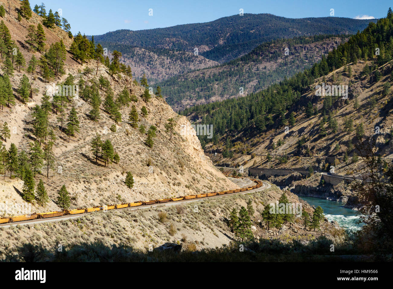 The Fraser Canyon mountains rising above the Fraser River in British ...