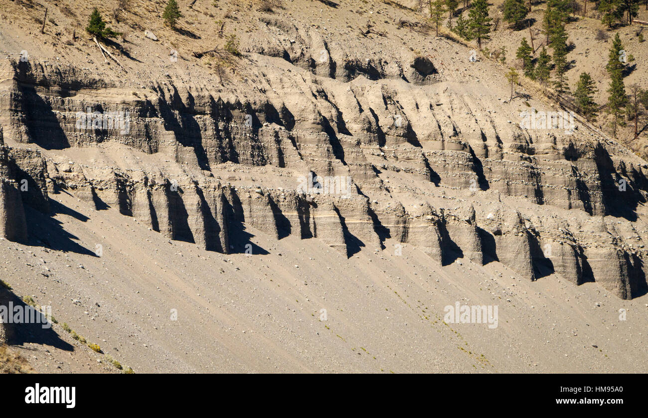 The Fraser Canyon mountains rising above the Fraser River in British ...