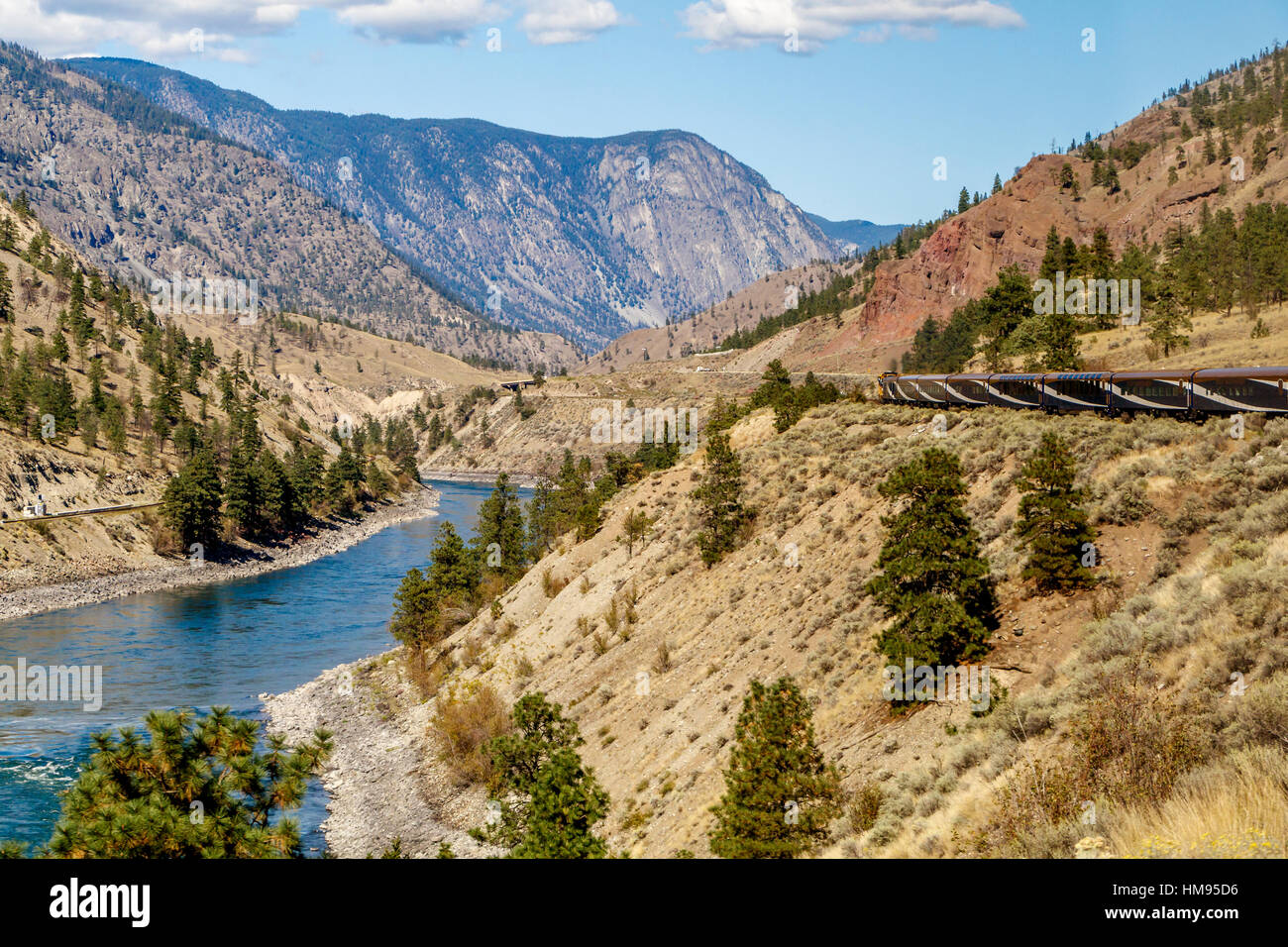 The Fraser Canyon mountains rising above the Fraser River in British ...