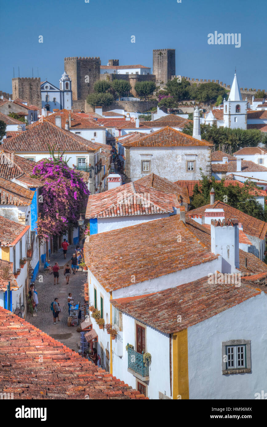 City overview with Medieval Castle in the background, Obidos, Portugal ...