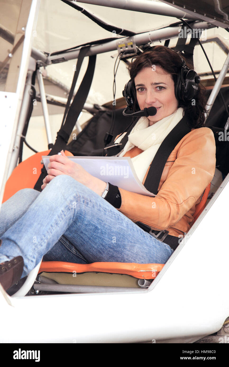Pilot young woman sitting in the cockpit of her microlight Stock Photo ...