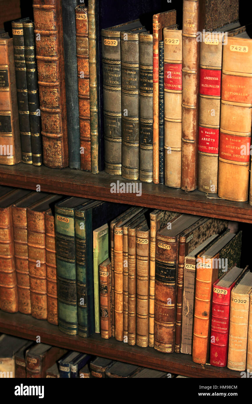 Old books in a library Stock Photo - Alamy