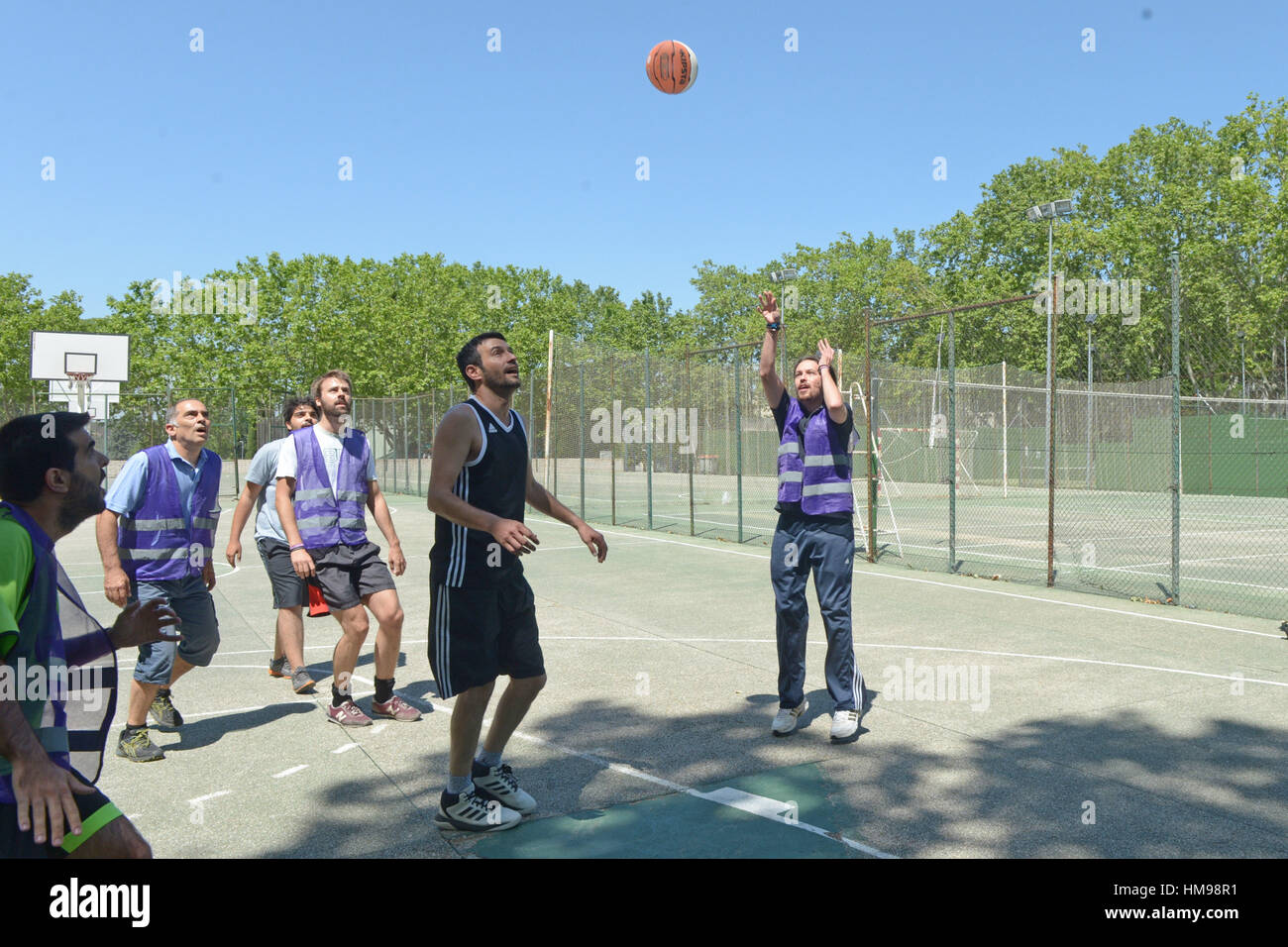 Politician Pablo Iglesias playing basketball during the day reflection ...