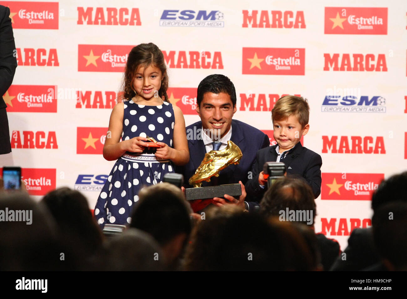 FC Barcelona's Luis Suarez, from Uruguay, center, poses to the media ...