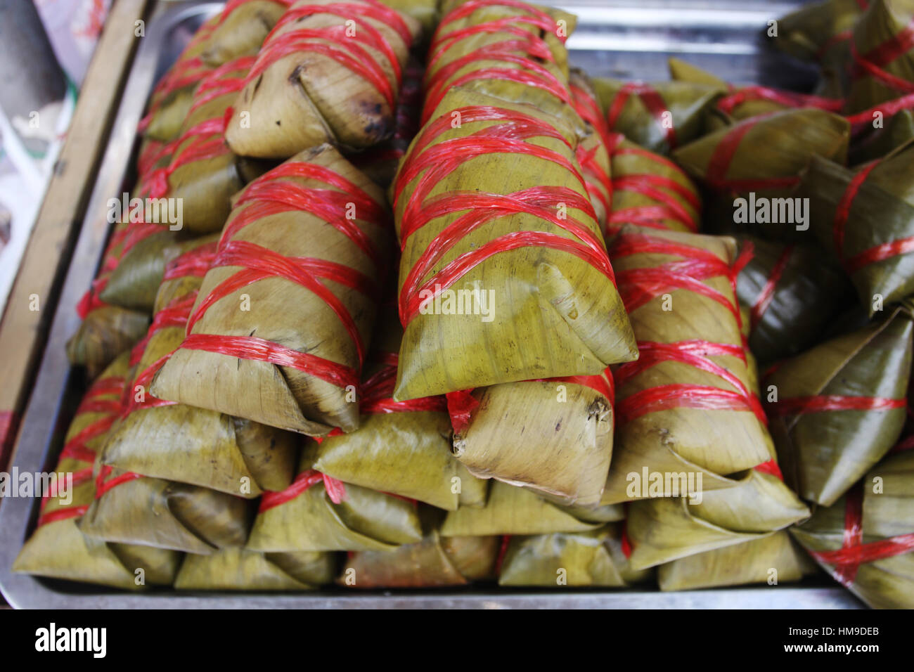 Rice cake in banana leaf Stock Photo - Alamy