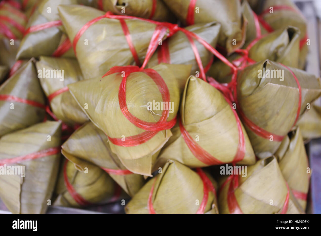 Rice cake in banana leaf Stock Photo - Alamy
