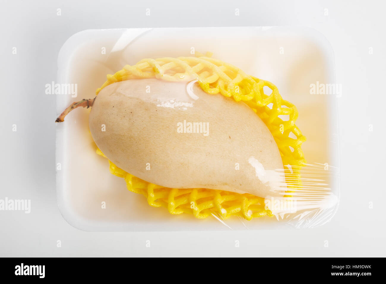 fresh yellow mango with white background, close up Stock Photo - Alamy