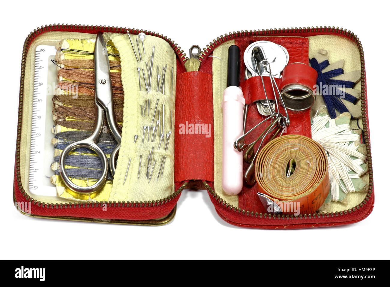 old travel sewing kit isolated on white background Stock Photo - Alamy