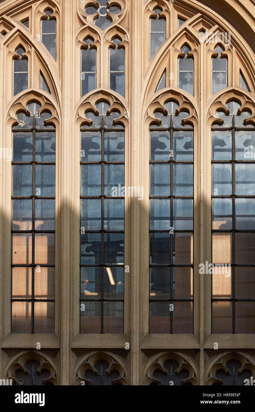Detail of historic arched window. Longwall Library, Oxford, United Kingdom. Architect: Wright ...
